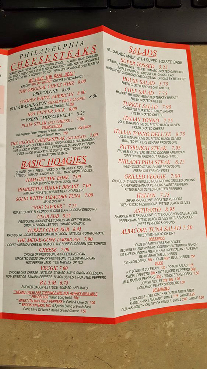 The menu reads like a love letter to Philadelphia street food, with cheesesteaks, hoagies, and burgers taking center stage.