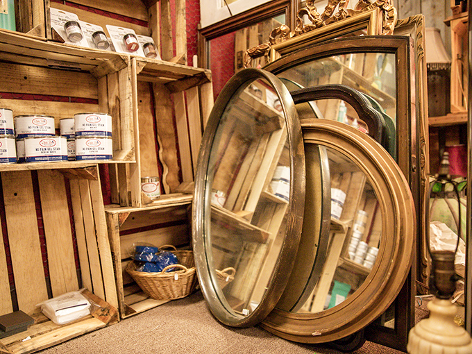 Vintage mirrors that have reflected a century of faces now wait for their next chapter. Each one framing possibilities rather than just reflections.