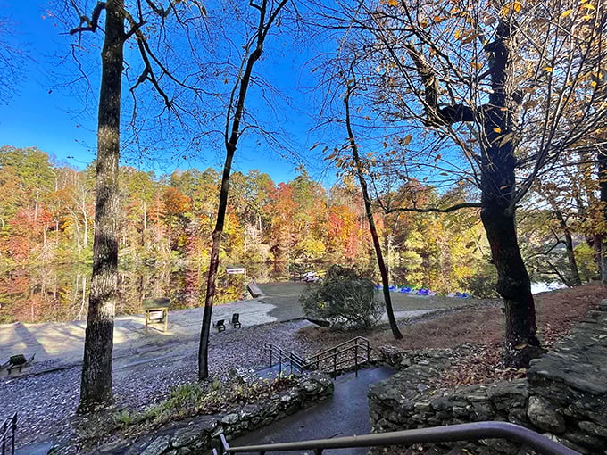Fall's paintbrush transforms Paris Mountain into a masterpiece of color, reflecting in still waters that seem to double the visual feast.