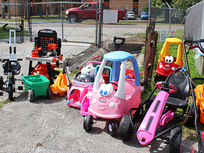 A rainbow coalition of Little Tikes cars, because every toddler deserves wheels with more personality than a sedan.
