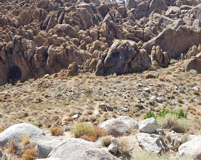 These weathered formations look like they've been arranged by some cosmic game of Jenga, each balanced precariously yet standing for millennia.