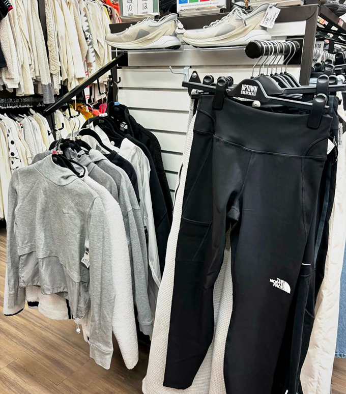 From cozy gray pullovers to North Face athletic wear, the racks offer premium brands that whisper "I paid full price" while your budget quietly celebrates.