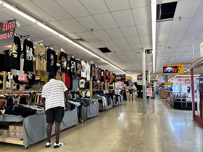 Browse racks where shoppers hunt for deals with the focused intensity of archaeologists discovering ancient artifacts.