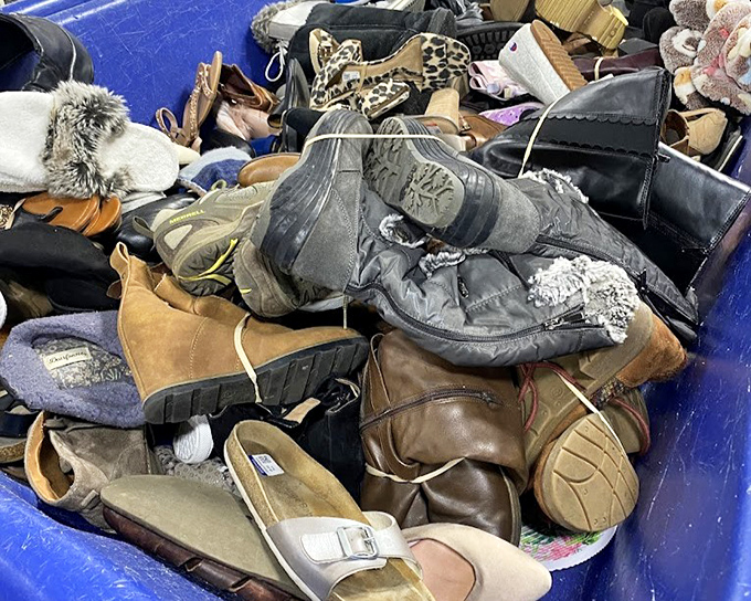 The footwear bin: where one person's castoff boots become another's perfect fit. The leather treasure hunt begins here!