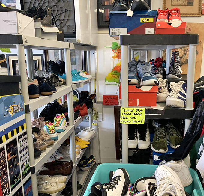 The shoe section rivals Imelda Marcos's closet, with that handwritten "Please Put Shoes Back" sign serving as both instruction and life philosophy.