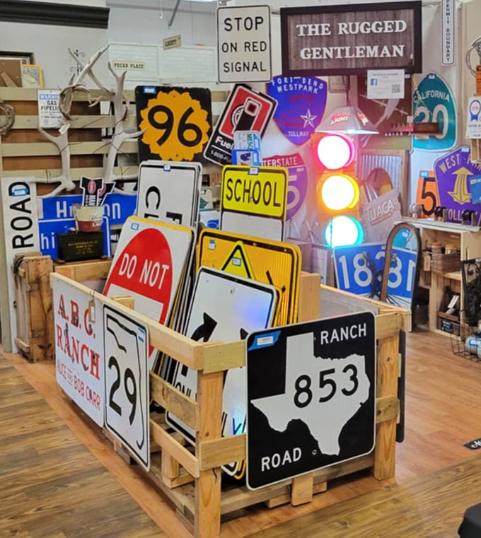 Road sign heaven! This collection would make any man-cave decorator weak in the knees&mdash;that working traffic light is practically begging for a home.