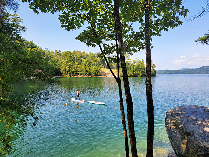 Social distancing, Mother Nature style: A lone paddleboarder finds solitude on Lake Jocassee's emerald waters, proving some escapes are better measured in ripples than miles.