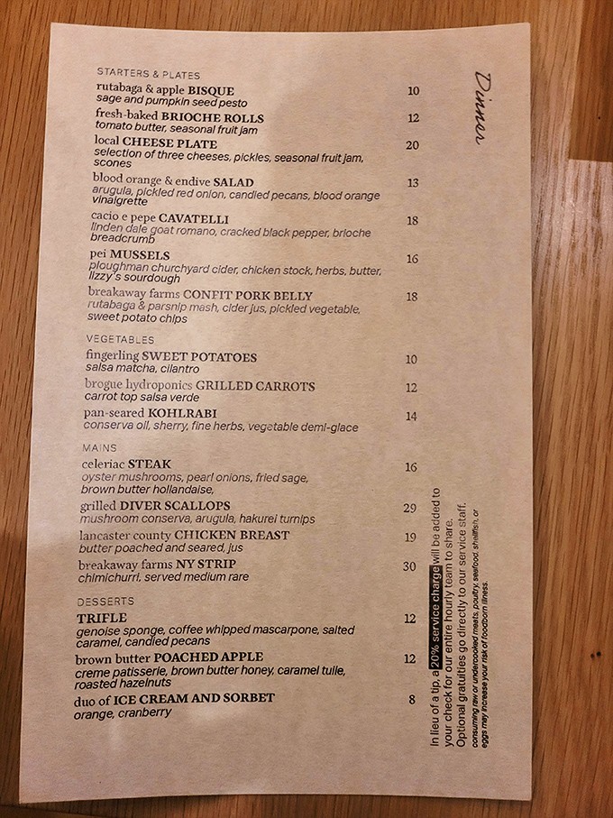 The menu reads like poetry—rutabaga bisque, brioche rolls, and local cheese plates that make decision-making deliciously difficult.