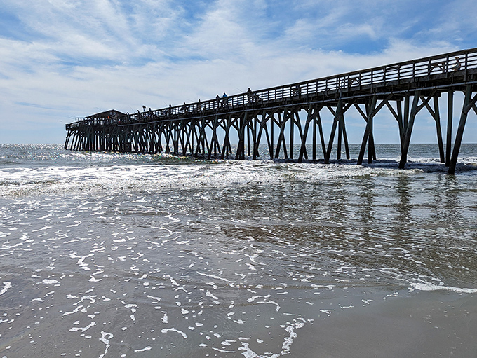 This isn't just any fishing pier—it's 531 feet of possibility stretching into the Atlantic, where fish stories and actual catches coexist.