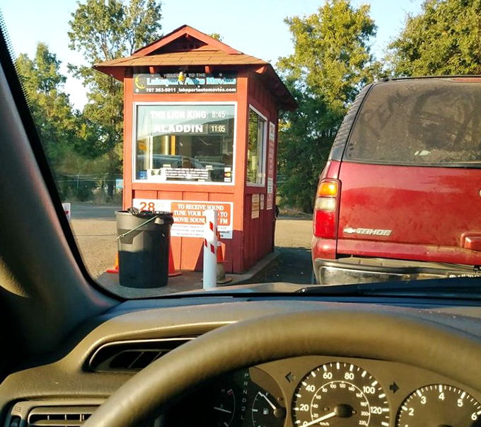 The little red ticket booth&mdash;cinema's gatekeeper where excitement begins and memories are stamped. No digital QR codes here, just genuine human interaction.