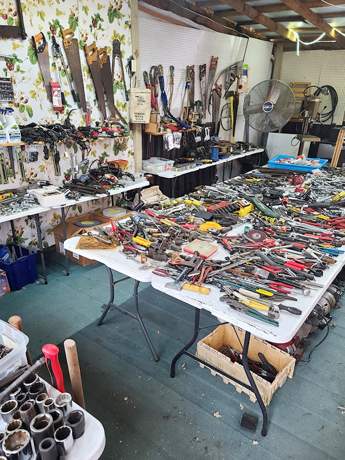 Tool heaven for the DIY enthusiast! This table holds more problem-solving potential than a hardware store's entire "help" department.