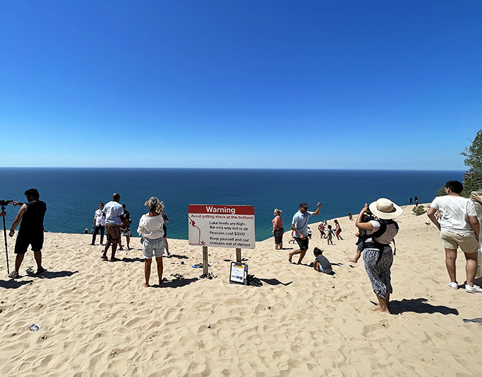 That warning sign might as well say, "Your Instagram photo isn't worth the two-hour climb back up." Spoiler alert: people ignore it anyway.