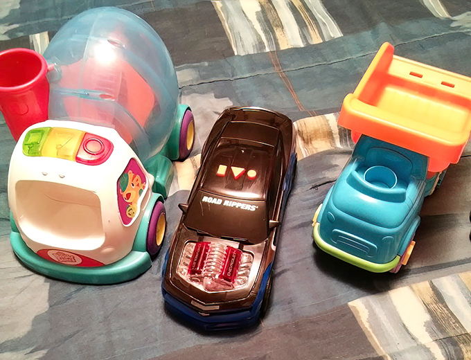 One shopper's outgrown toys become another child's treasure. These colorful plastic chariots await new adventures and imaginative journeys at pocket-change prices.