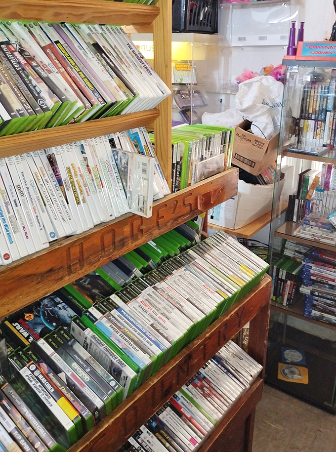 Gaming paradise alert! Shelves packed with forgotten favorites and modern classics. Your childhood memories are priced to move and ready for replay.