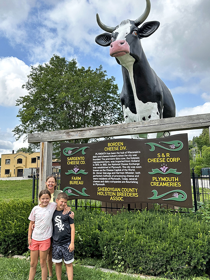 Generations gather beneath Antoinette's watchful gaze, creating memories that will last longer than the finest aged cheddar. Family photo tradition at its finest.