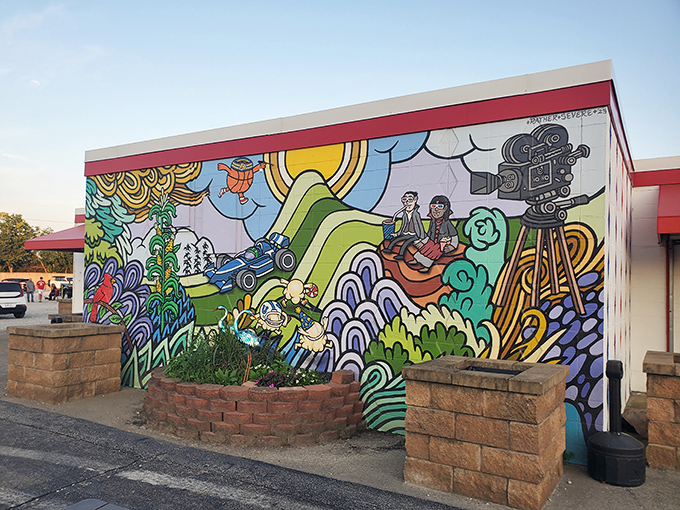 This vibrant mural celebrates cinema's magic with psychedelic flair. A splash of color that perfectly captures the joy of moviegoing.