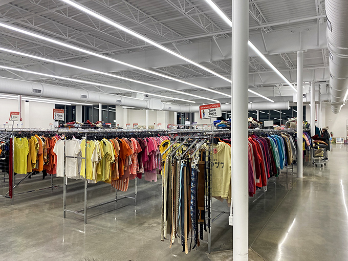 A rainbow of possibilities hangs in perfect order. Color-coded clothing racks make finding that perfect yellow sundress feel like destiny, not drudgery.