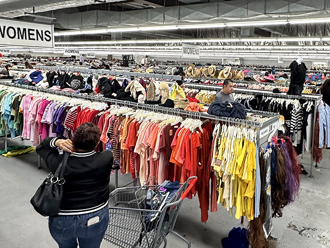 Rainbow racks stretch endlessly like a fashion lover's fever dream, each hanger holding someone's former favorite outfit.