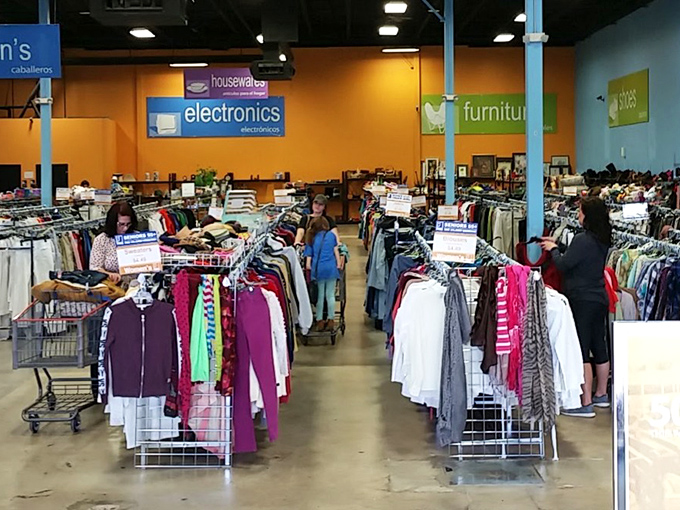A sea of colorful garments awaits shoppers navigating the women's section. It's like a textile treasure hunt where patience yields designer rewards.