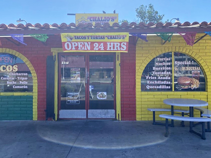 That bright yellow beacon calls to hungry souls at all hours - a taco lighthouse in the Fresno night.