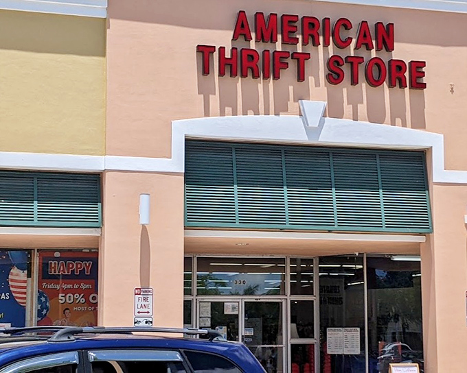 American Thrift Store's bold red signage beckons bargain hunters like a lighthouse for the budget-conscious.