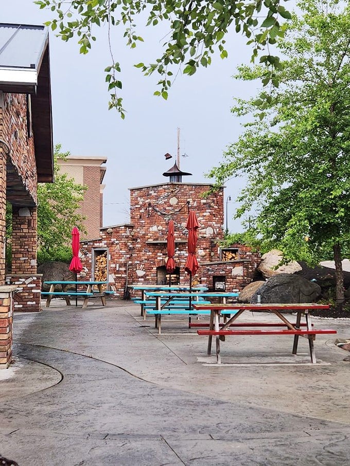 That outdoor patio whispers promises of lazy afternoons spent savoring slow-smoked meats under Michigan's beautiful skies.