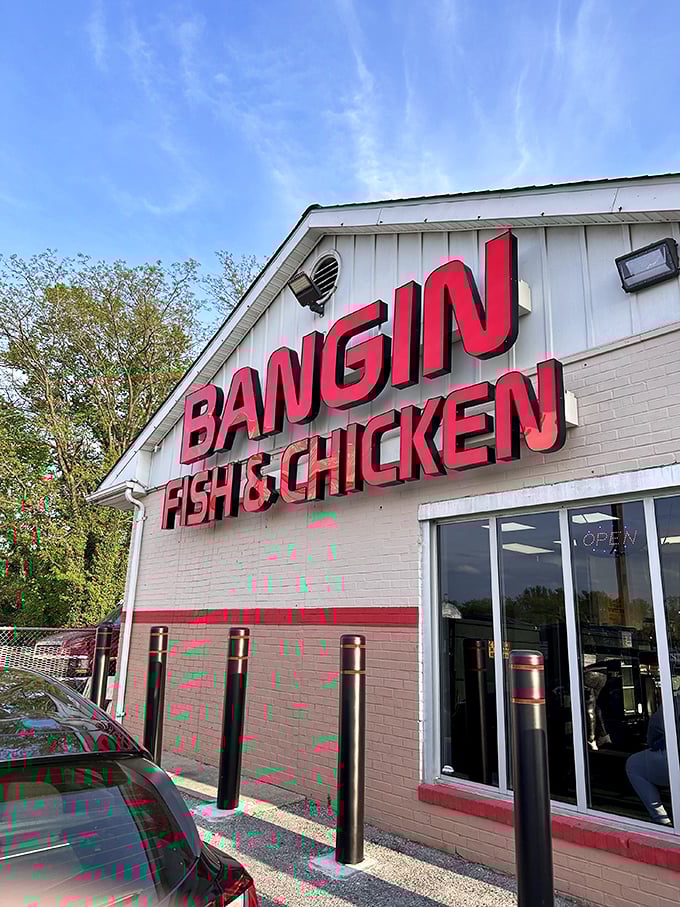 Bold red signage promises big flavors, and this unassuming strip mall gem delivers on every single promise.