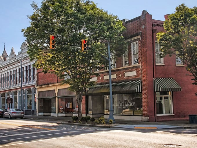 Small-town squares where neighbors gather and time moves at conversation speed, not highway pace.