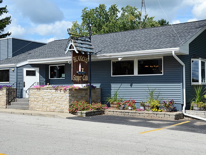 Stone accents and flower boxes create the perfect "welcome home" feeling every supper club should have.