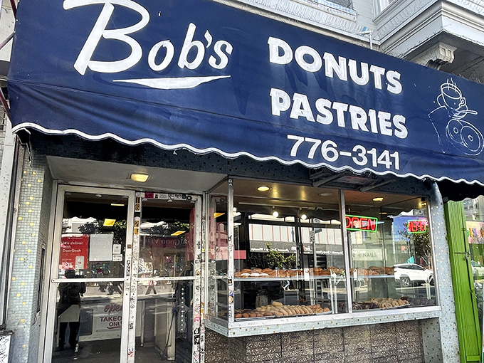Bob's blue awning has weathered decades of San Francisco fog while serving up timeless donut perfection below.