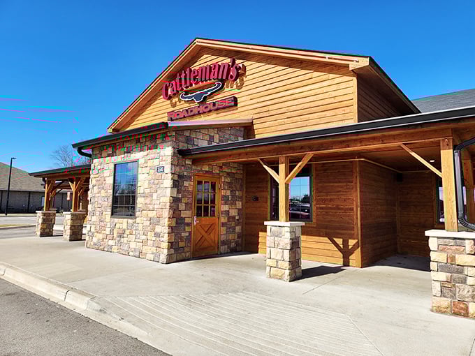 This rustic roadhouse exterior whispers promises of perfectly grilled steaks and genuine Western hospitality inside.