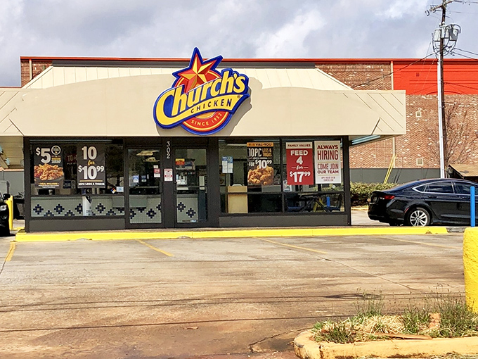 Church's iconic star sign shines like a beacon for crispy chicken seekers. Those honey-butter biscuits are calling your name!