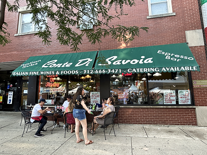Conte Di Savoia's awning beckons like an Italian grandmother calling you to Sunday dinner.
