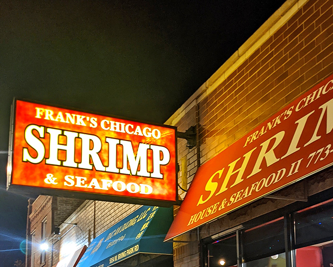 Frank's neon sign glows like a beacon in the night, guiding shrimp pilgrims to their crispy, golden destination.
