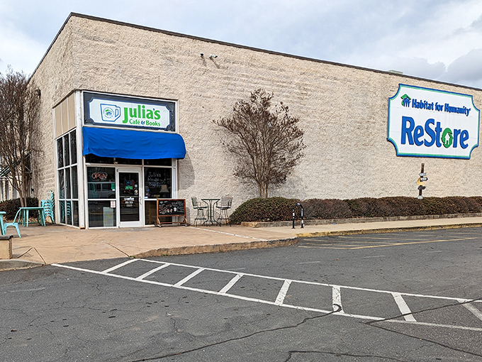That massive Habitat ReStore sign isn't just advertising - it's practically a beacon calling all DIY dreamers and bargain hunters.
