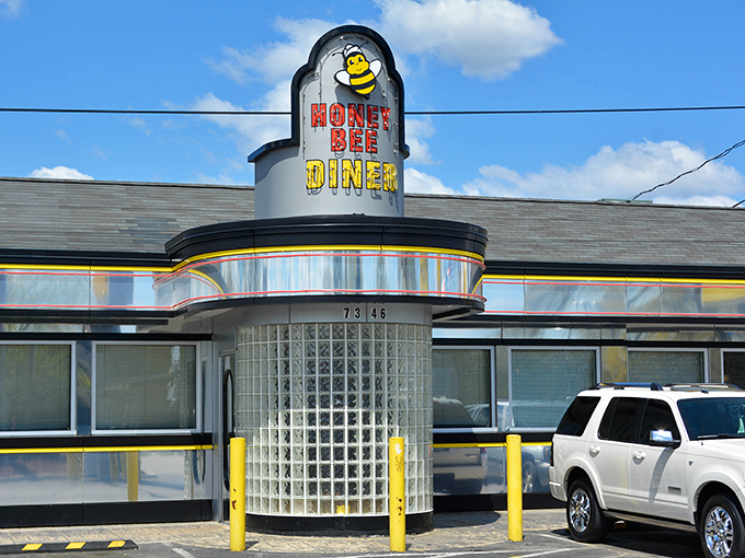 Hello, honey! The Honey Bee Diner's cheerful sign and glass block entrance is sweeter than the milkshakes waiting inside.