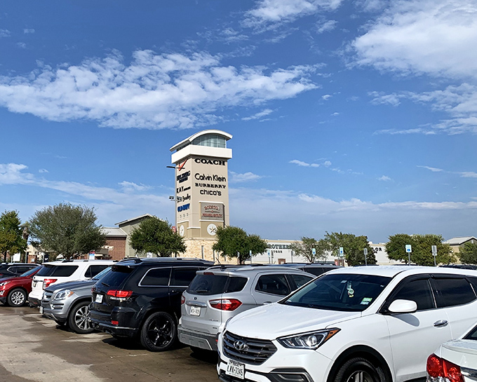 This tower stands tall like a beacon calling all bargain hunters to discount heaven below.