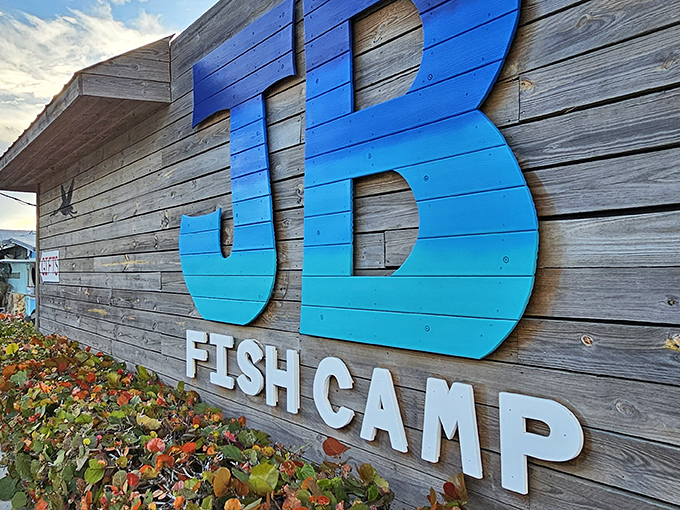 JB's Fish Camp's weathered sign and rustic charm are like a siren call to seafood lovers seeking the real Florida experience.