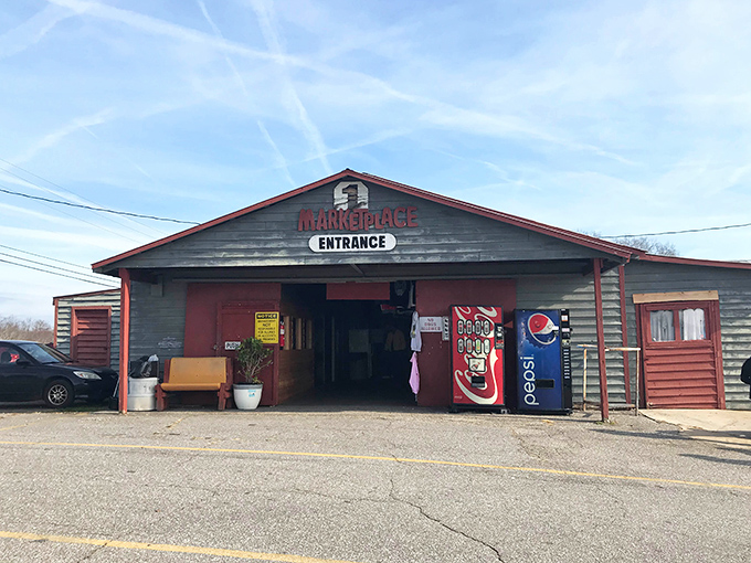 The rustic entrance to Jamestown Flea & Farmers Market welcomes treasure hunters with old-fashioned country charm.