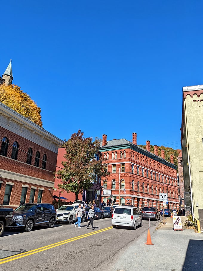 Jim Thorpe's hillside buildings climb toward heaven like a stairway made of red brick and dreams.