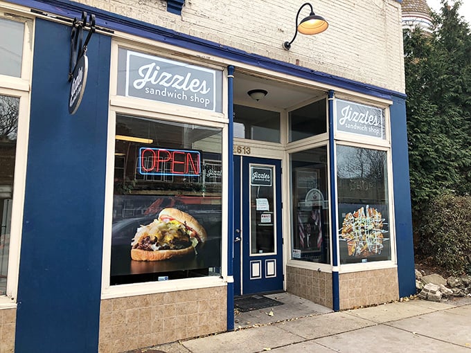 That bright blue storefront practically winks at you, promising sandwich adventures that'll make your day brighter.