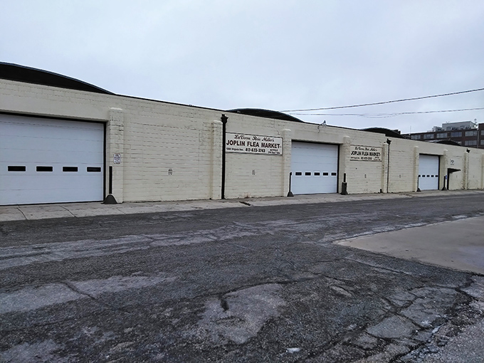 Joplin Flea Market's unassuming exterior hides a world of wonders. Like finding a secret clubhouse for grown-ups who love bargains.