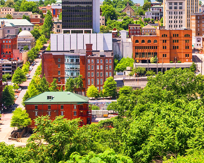 Lynchburg's downtown stretches before you like a Norman Rockwell painting that learned to parallel park.