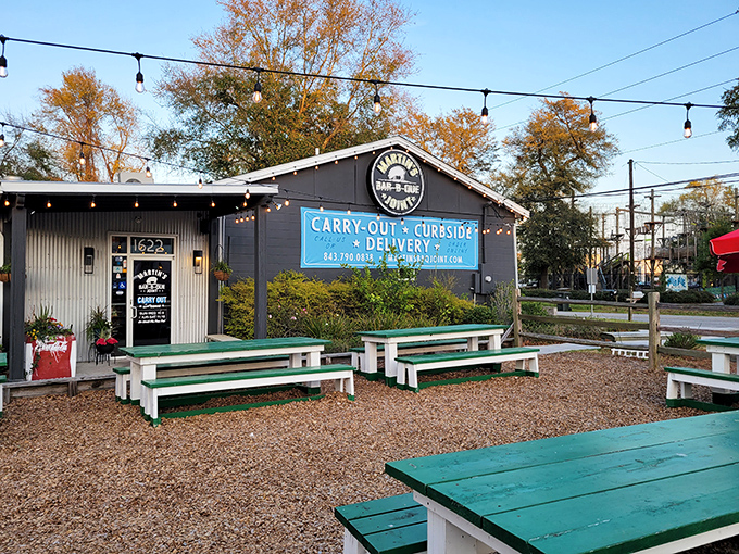Martin's Bar-B-Que Joint's outdoor picnic tables await under string lights &ndash; dinner and a show of stars.