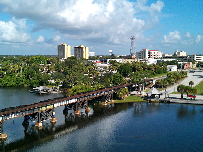 Melbourne's skyline rises modestly from lush greenery, proving you don't need skyscrapers for sophistication.