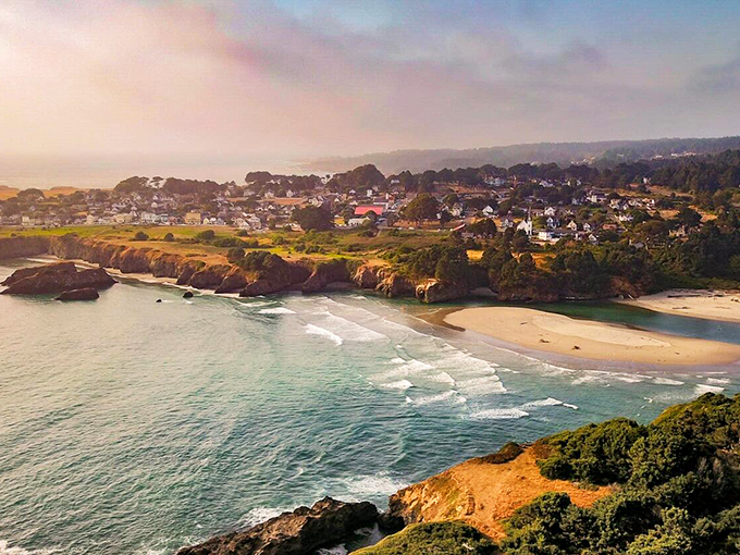 Mendocino's coastal magic unfolds where pine-scented breezes dance with ocean waves below.