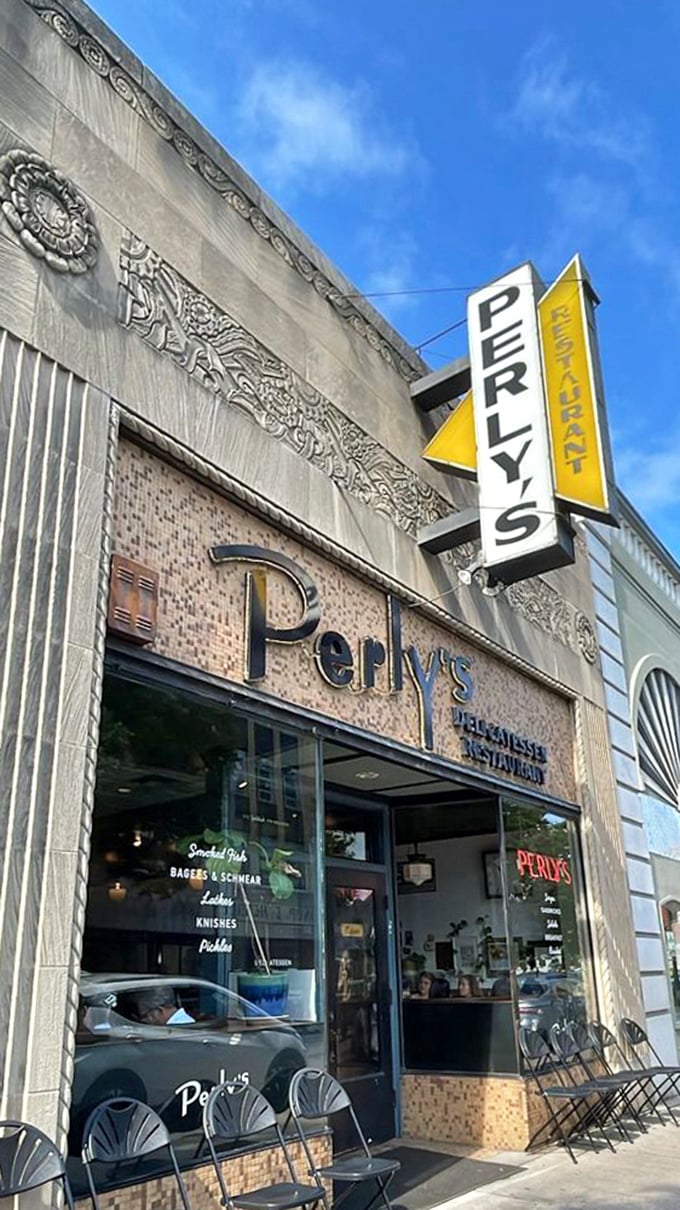 This vintage storefront with ornate details whispers stories of countless bagels, pastrami, and satisfied customers through decades.