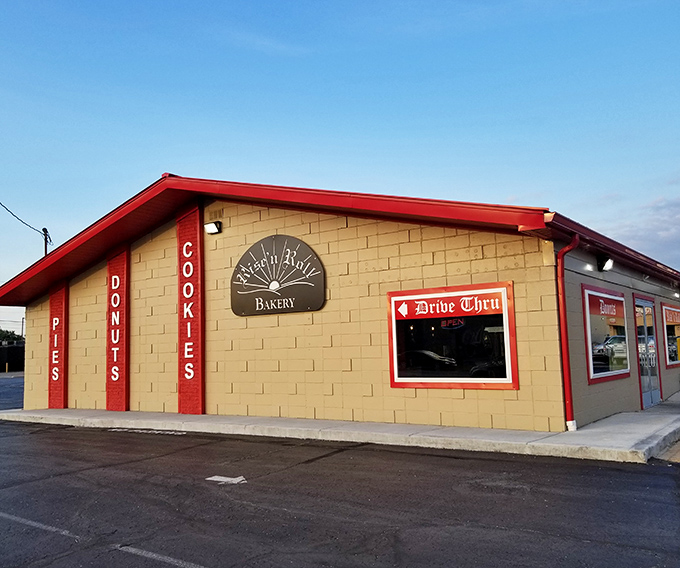 That bright signage signals serious donut business - the kind that makes early morning wake-up calls worthwhile.