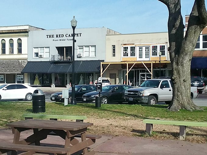 What a delightful scene, a charming main street with a prom and tuxedo shop ready for a big night out.