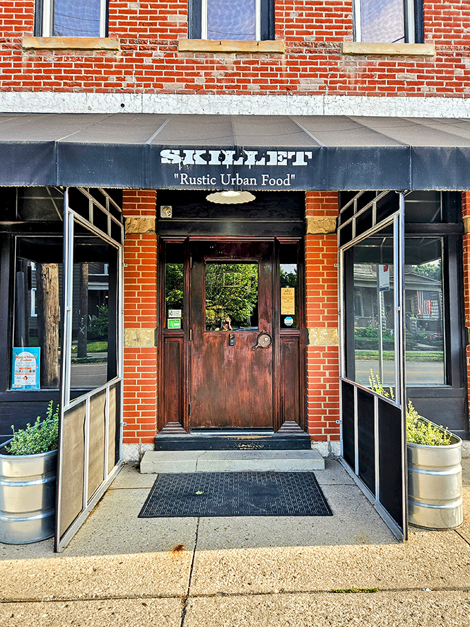 That weathered wooden door whispers stories of countless breakfast adventures waiting to unfold inside.